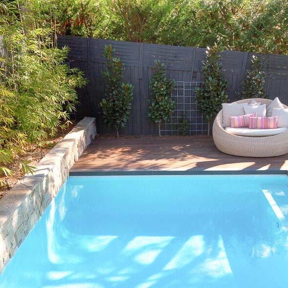 Lower North Shore Pool Design with Stone Feature Wall | Northbridge ...