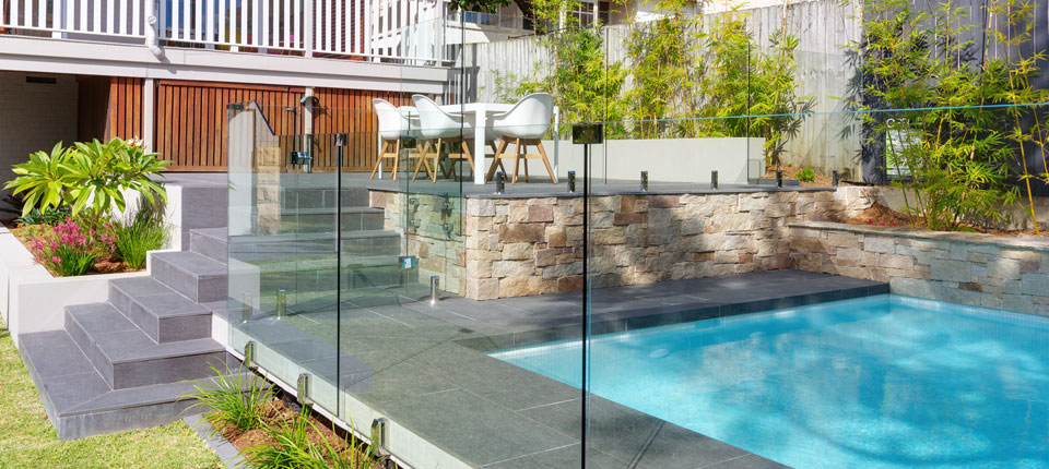 Lower North Shore Pool Design with Stone Feature Wall | Northbridge ...