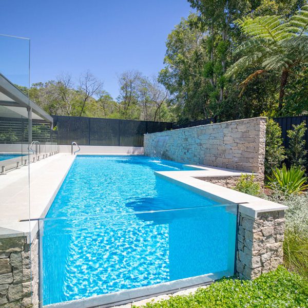 Northern Beaches Swimming pool design with glass window, lap pool