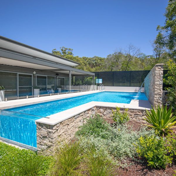 Northern Beaches Swimming pool design with glass window, lap pool