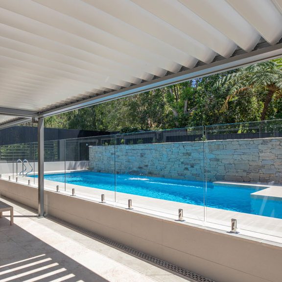 Northern Beaches Swimming pool design with glass window, lap pool